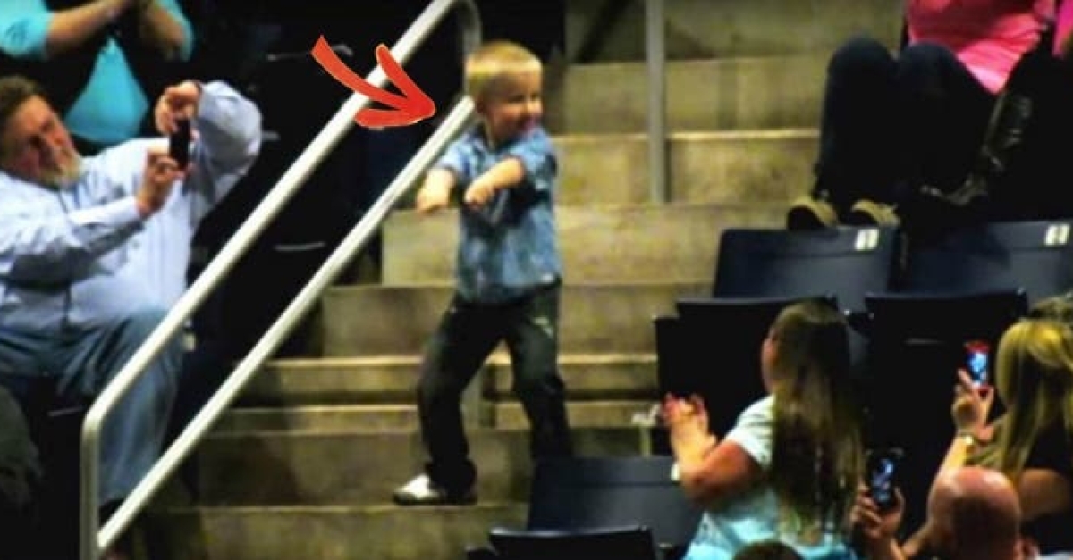 This boy gets up in the middle of a concert and starts dancing... A few ...